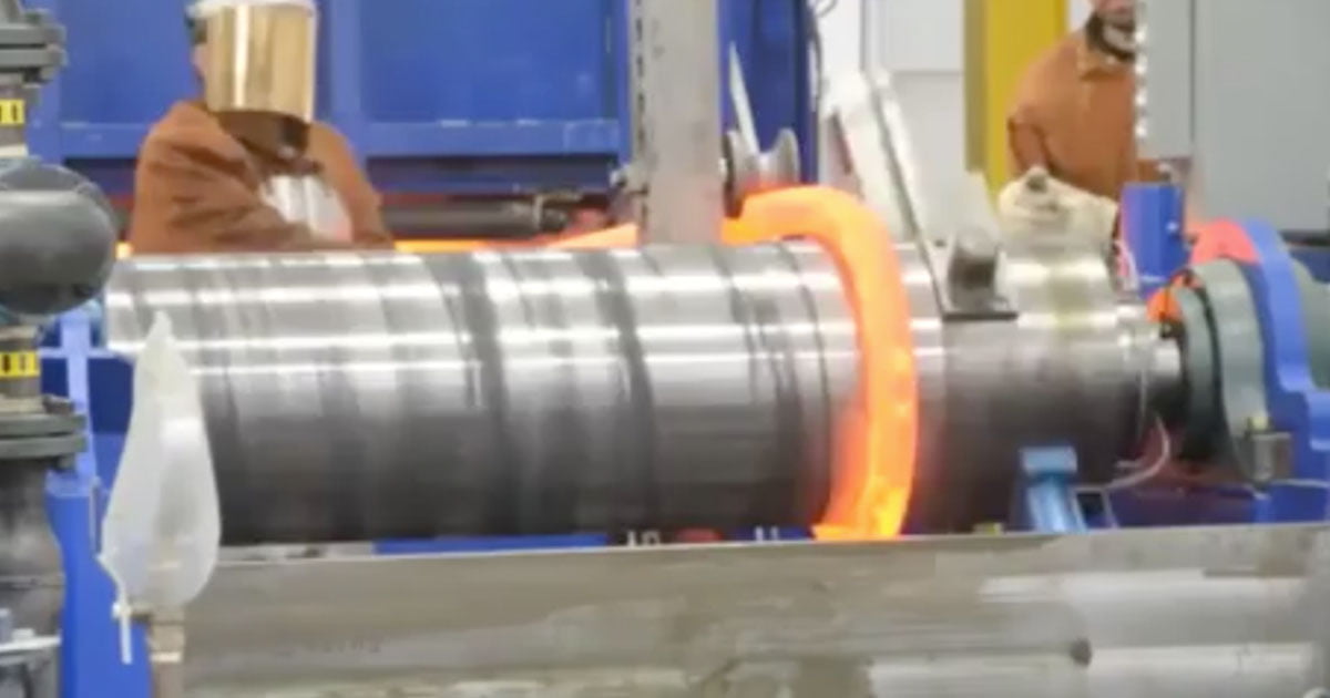 Hot steel rod being rolled into a giant spring! - 9GAG