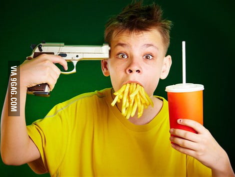 Eating with gun - 9GAG