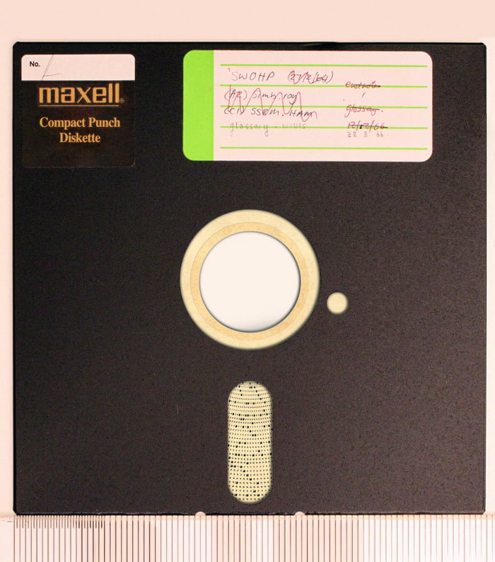 The earliest versions of floppy disks had punched paper inside, not ...