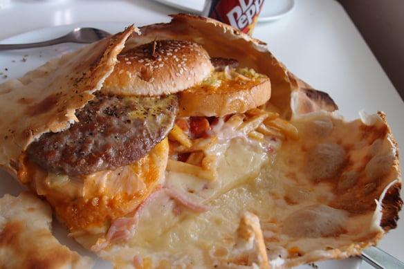 Calskrove. A calzone with a burger and fries inside. Very popular in northern Sweden... - 9GAG