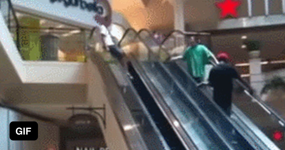 Cool kid sliding down an escalator railing - 9GAG