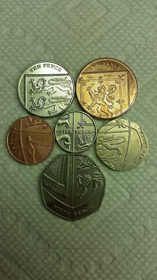 The 'tails' side of British coins form the Royal Shield of Arms. - 9GAG