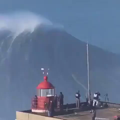 The world's highest waves, in Nazare, Portugal. There's a canyon that ...