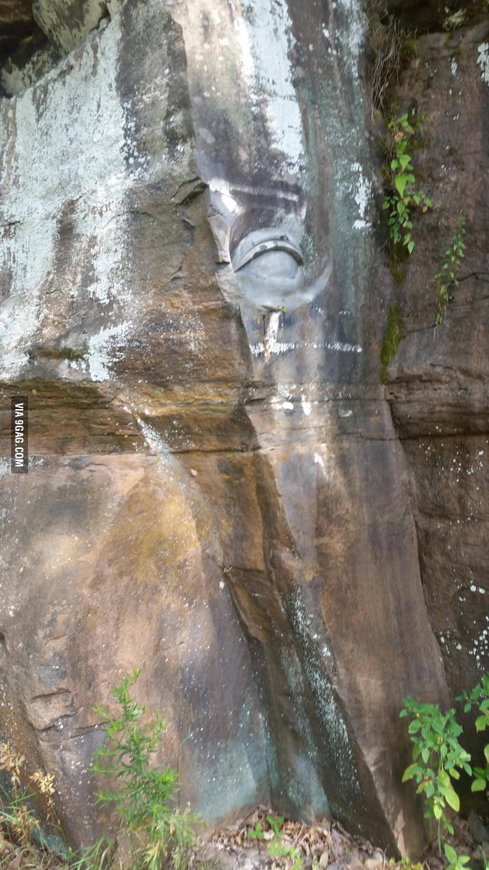 This eye carved into a rock on the side of the road - 9GAG