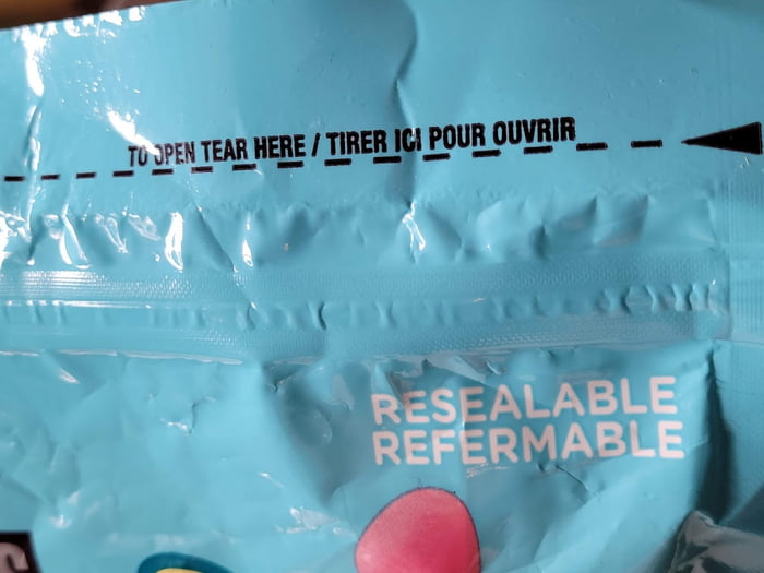 "Tear Here", but really "over there" - 9GAG