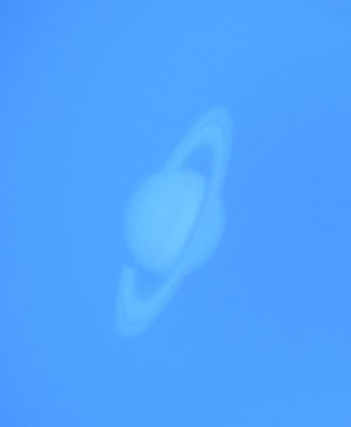 A photo of Saturn taken during the day. - 9GAG