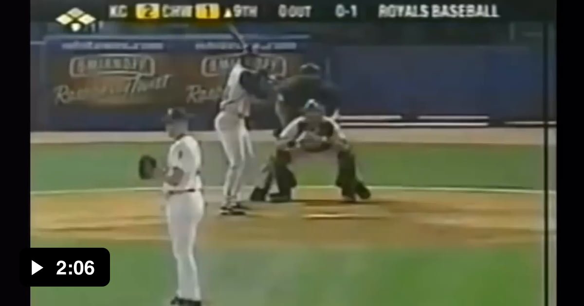 9/19/02: Two White Sox fans attack Royals 1B coach Tom Gamboa during a ...