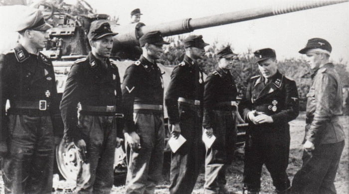 Untersturmführer Karl Brommann and the crew of his Tiger II on the ...