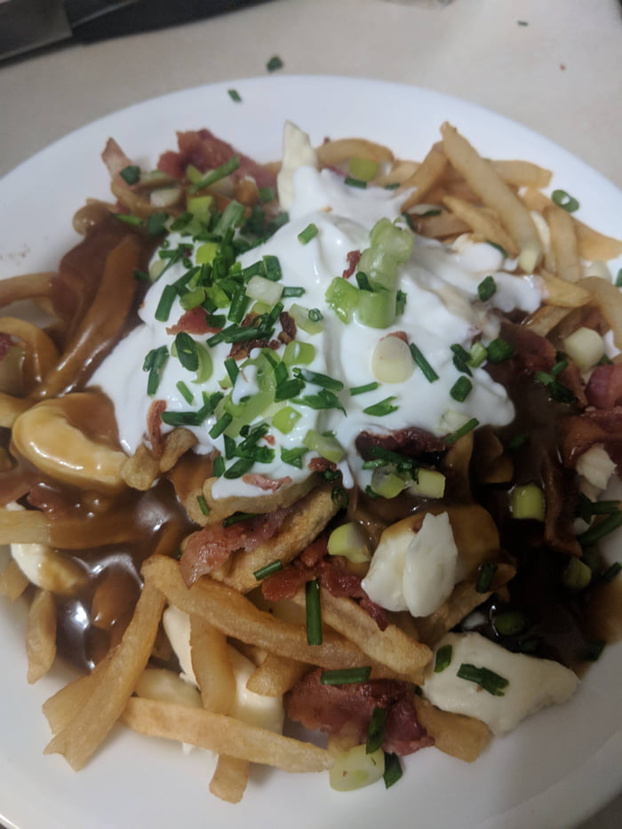 Supreme Poutine. Beef gravy, fresh real cheese curds, bacon, green ...