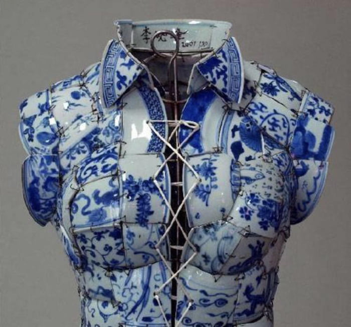 A dress made out of porcelain. Some of the pieces are from the Qing ...