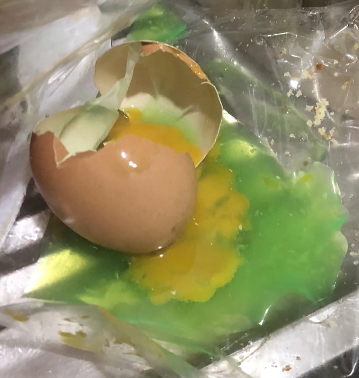 Cracked a Costco egg—green slime and a sickly yolk. Breakfast or ...