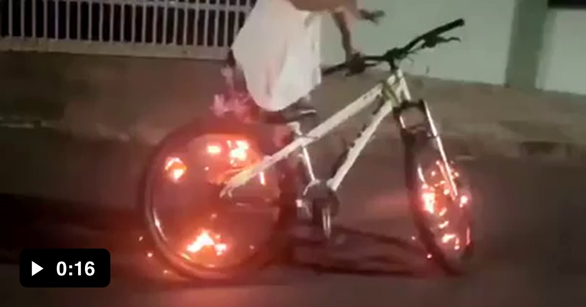 This guy is riding a bike on fire. - 9GAG