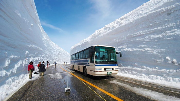 Every year the Japanese clear 20 meters (65 feet) of snow to open this ...
