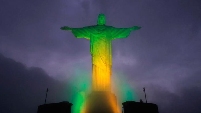 The statue of Christ the Redeemer in Rio was painted in the colors of ...