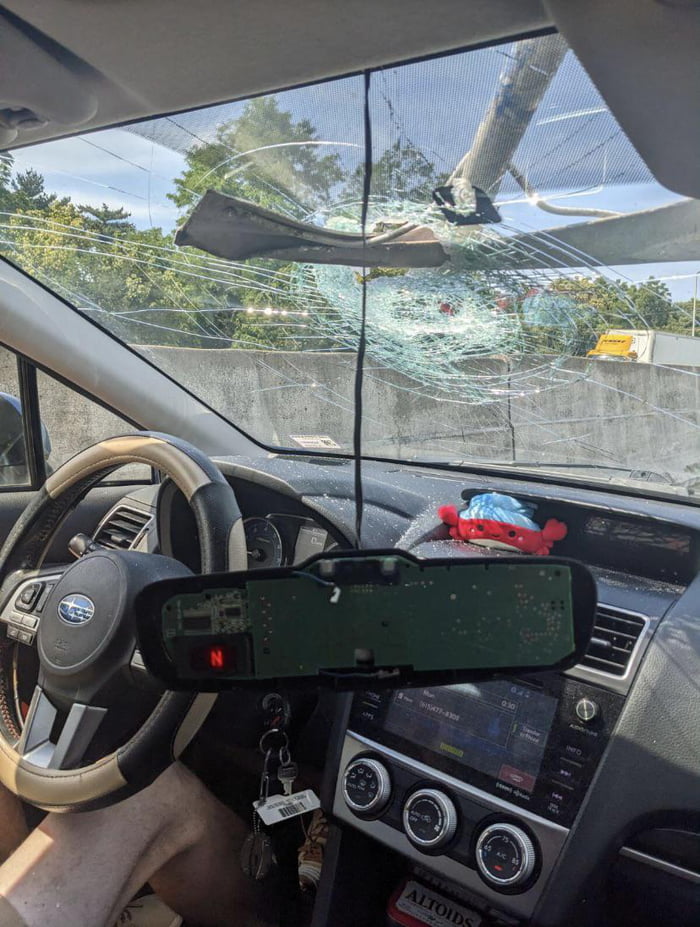 Teen driving on highway when this pickaxe flew off truck in front of ...