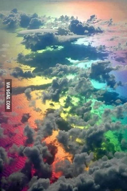 Picture Taken From a Plane Above Clouds and a Rainbow - 9GAG