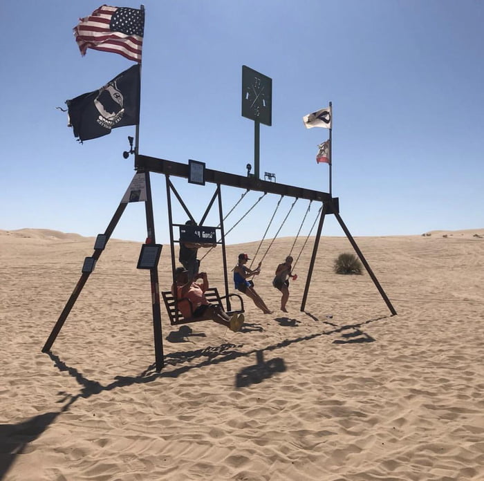 There is a huge swing set in the middle of nowhere at the Glamis Sand ...