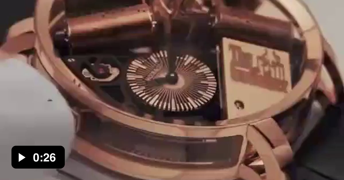 Tiny watch music box playing The Godfather theme - 9GAG