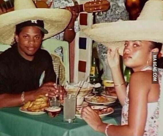 Eazy E wearing a hat inside a sombrero. - 9GAG