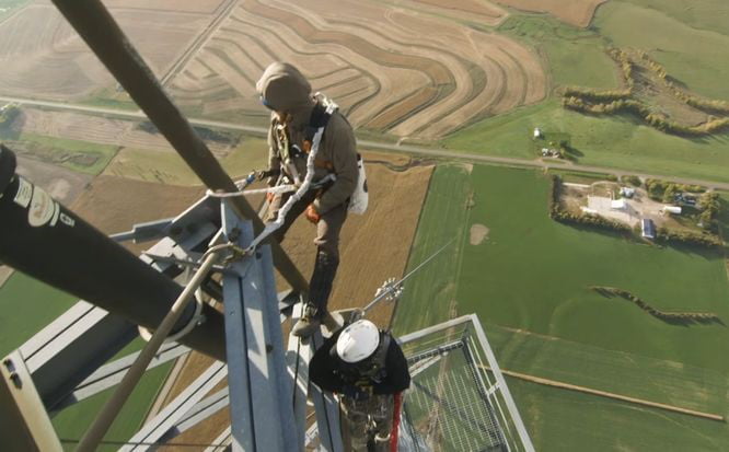 Maintenance Working on a 2000 ft tall Tower. - 9GAG