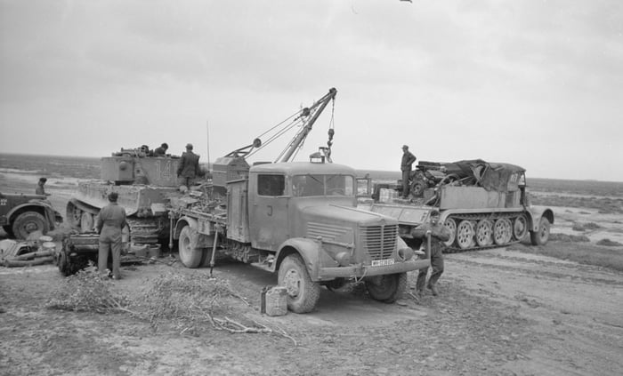 Pz VI Tiger of the 501st Heavy Tank Battalion getting a new engine in ...