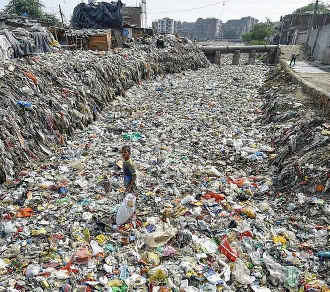 Urban stream that is full of waste - 9GAG