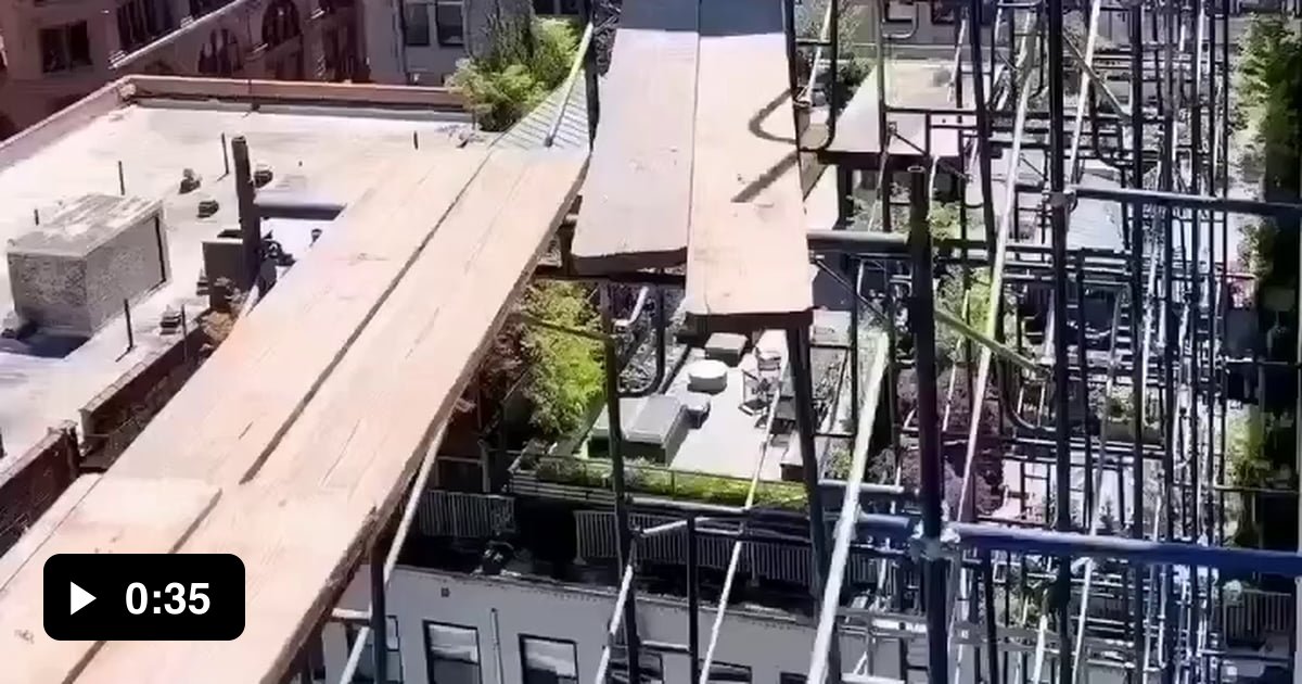Risk and Precision: The Art of High-Altitude Construction - 9GAG