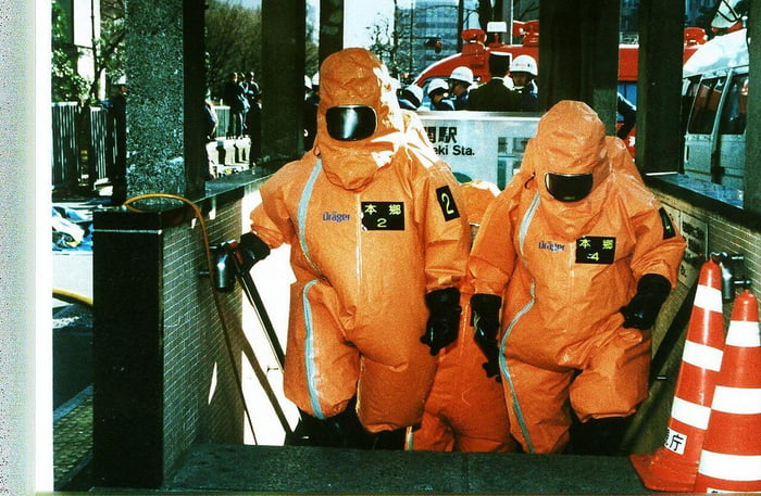1995. Tokyo firefighters at Kasumigaseki subway station during a sarin ...