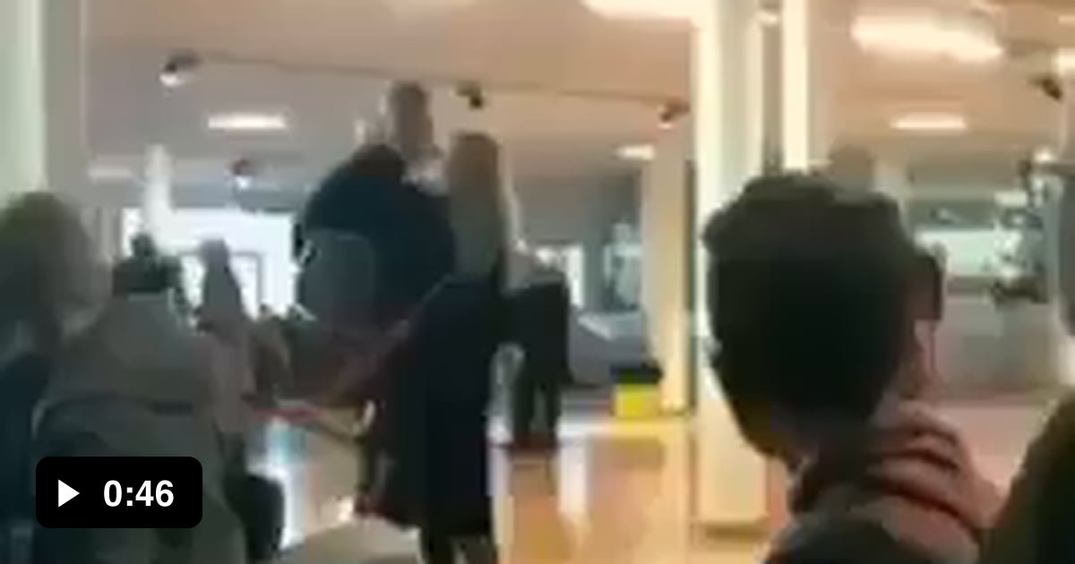 A man and a woman covet the same chair, it ends in a knockout. - 9GAG