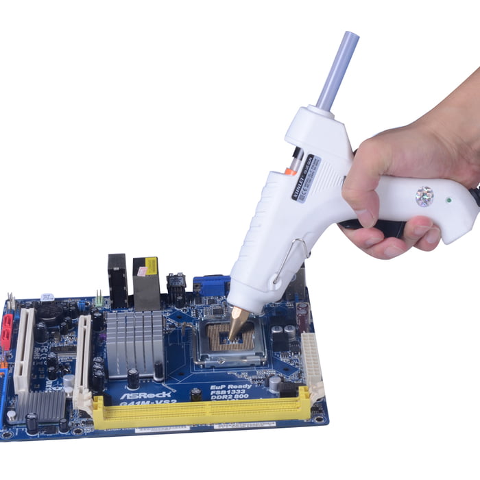 Step 2: Apply a small amount of hot glue to secure your CPU - 9GAG