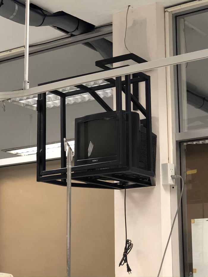 This TV and it’s security cage - 9GAG