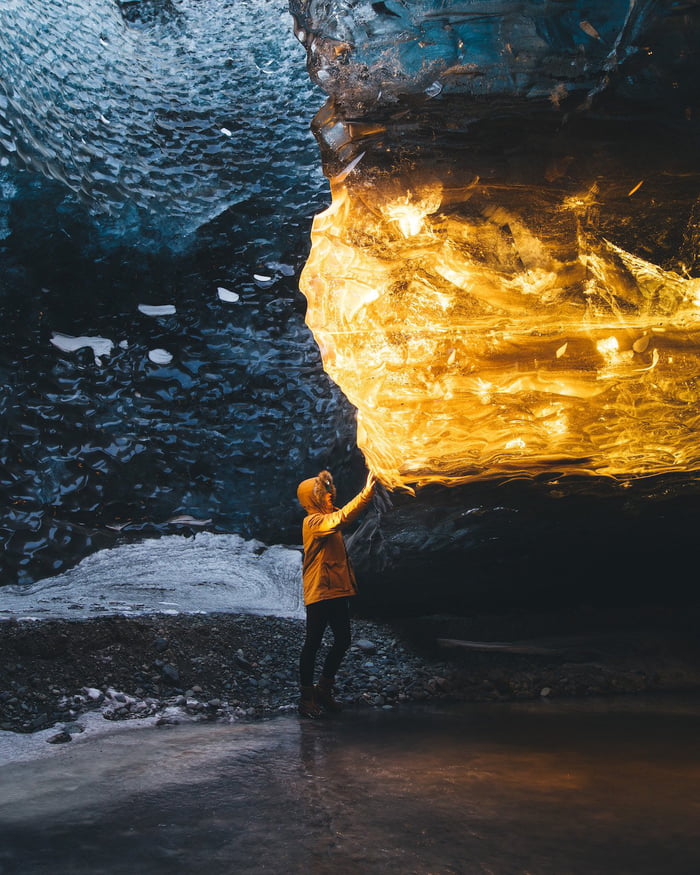 When the sun hits just right at this glacier ice cave in Iceland ...