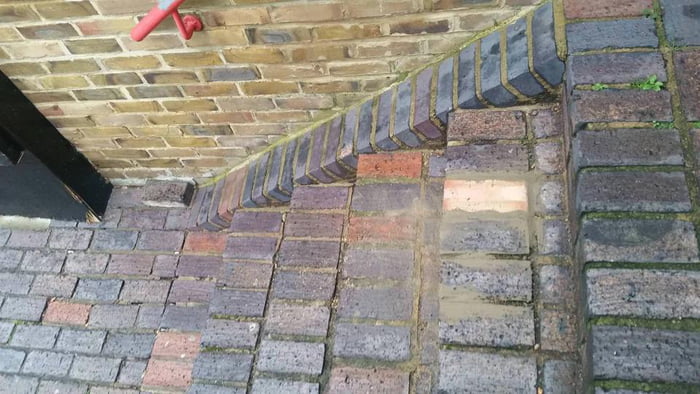Loose brick replaced by a different colour, while the original is right ...
