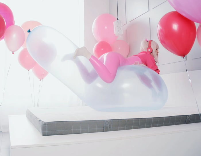 Beauty riding a huge balloon - 9GAG