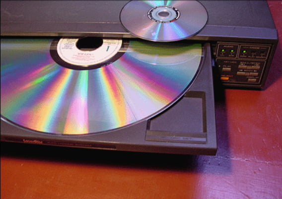 Meet the LaserDisc, 12 inch analog discs that predate DVDs and CDs and ...