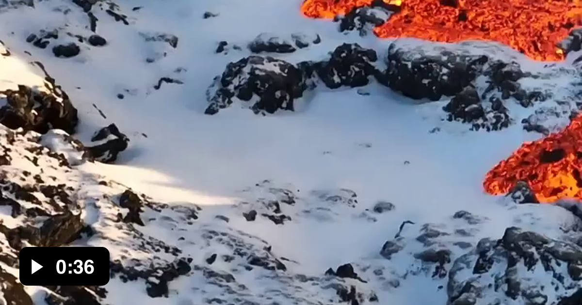 A video of ice and fire - lava flowing over snow - 9GAG