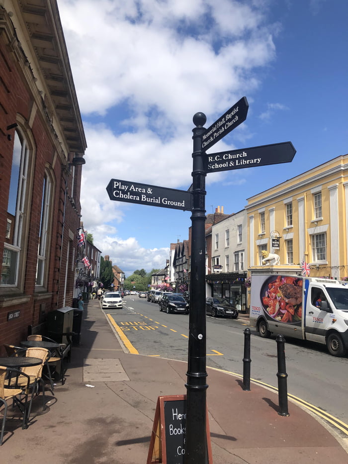 Typical signpost in a sleepy English country town. - 9GAG
