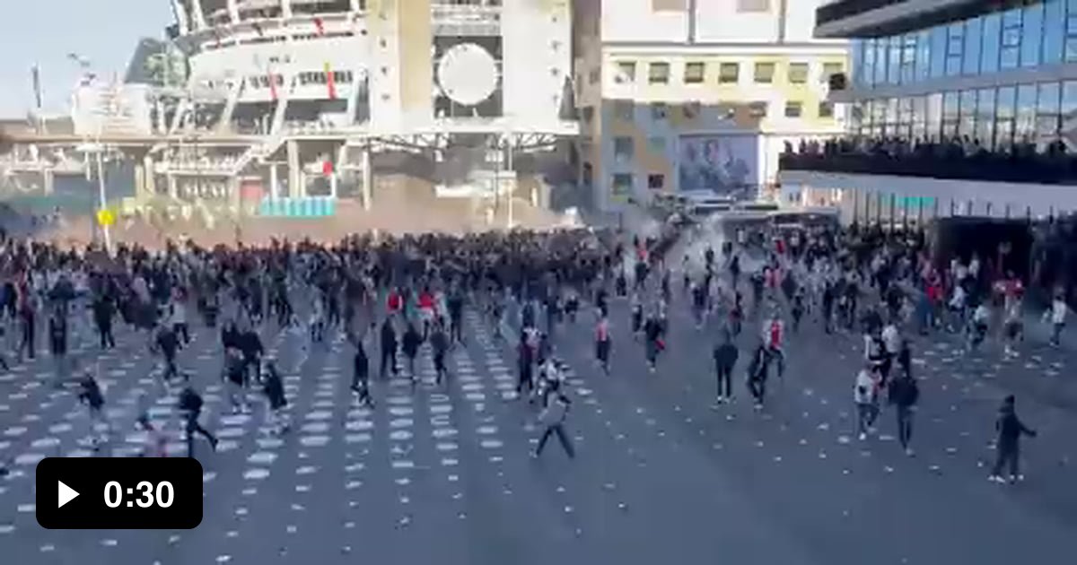 Police using tear gas to disperse people outside of the stadium in ...