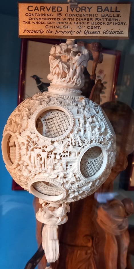 A decorative carved Ivory ball once belonging to Queen Victoria. It ...
