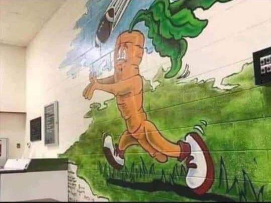 In a school lunchroom. Anyone else think this carrot should be wearing ...