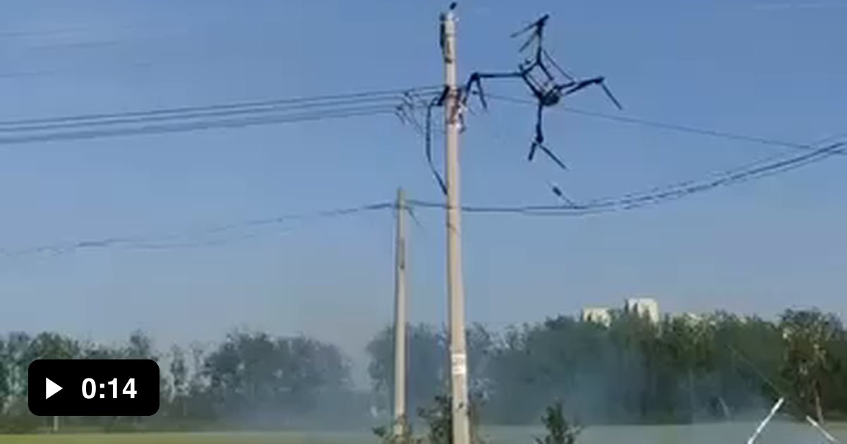 Big drone stuck in power lines. - 9GAG