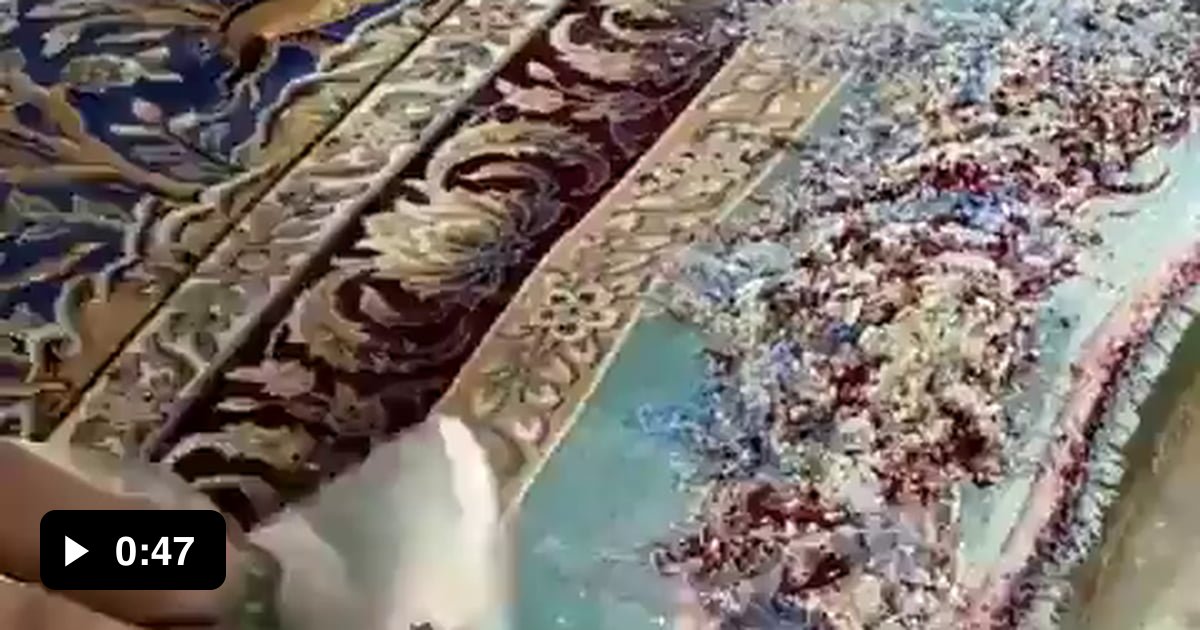 This is rug shaving. Certain types of rugs are hand finished this way ...