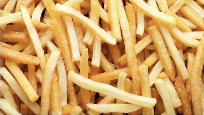 Five Guys gives extra fries at the bottom of the bag so the guests ...