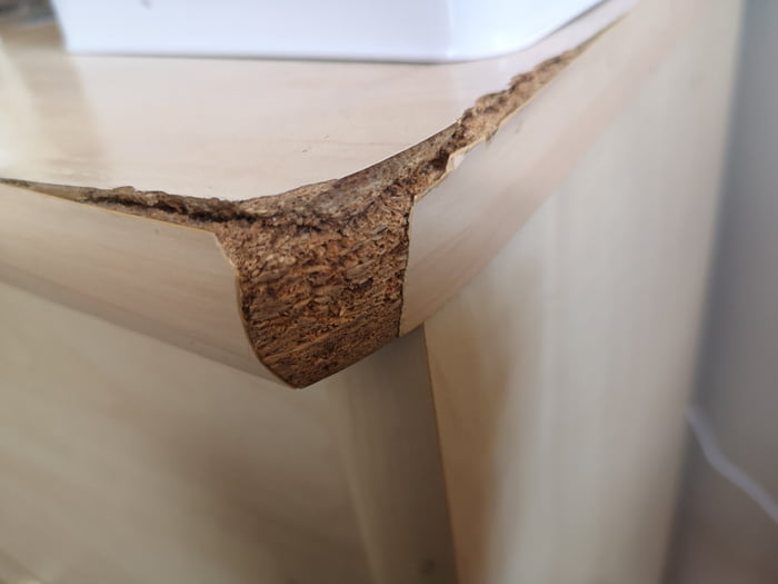 Any advise on how to fix smth like this. Wood putty, vinyl or just put ...