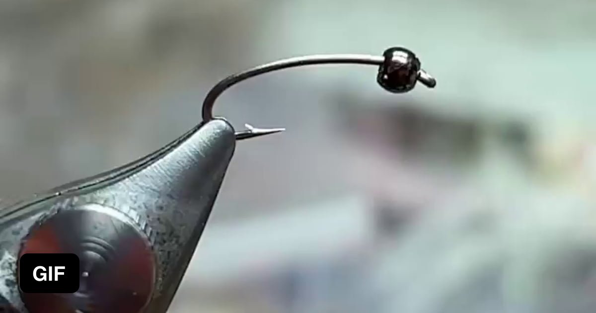 Making artificial fly, a type of lure used in fly fishing that imitates ...