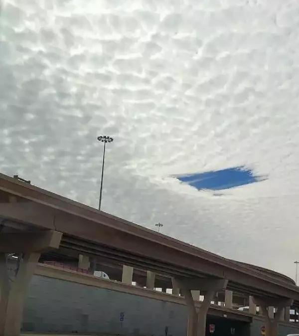 Strange square hole in the cloud cover. - 9GAG