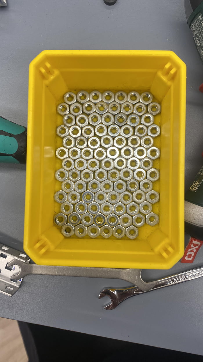 Got distracted making this pattern with these nuts and couldn’t get the last one to fit in no ...