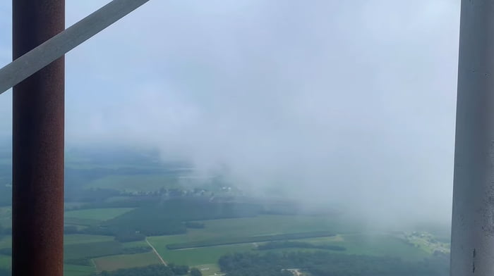 Working on a 2000ft tall tower and there is a big cloud comming. - 9GAG