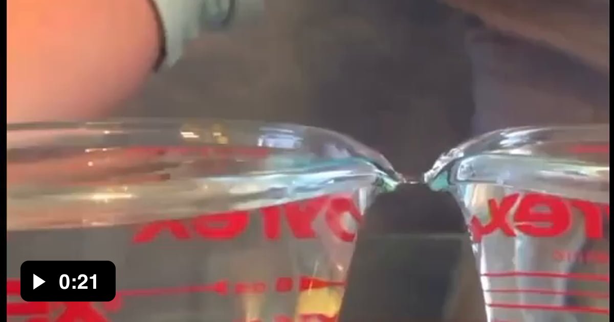 A high voltage applied to these 2 beakers filled with water forms a ...