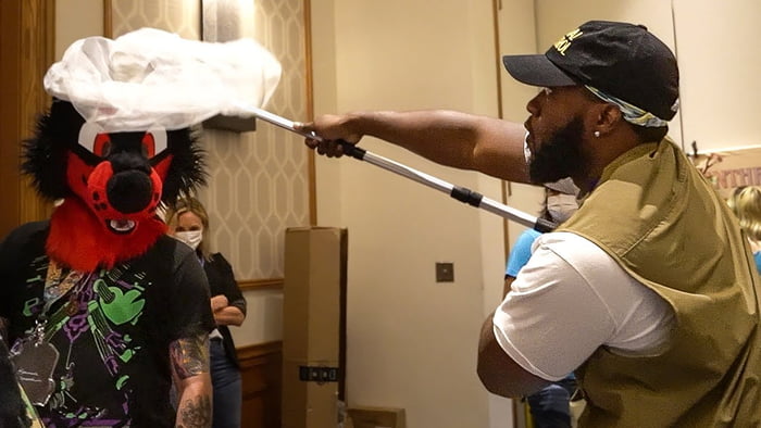 Man dressed as "Animal Control" officer crash a Furry convention to ...